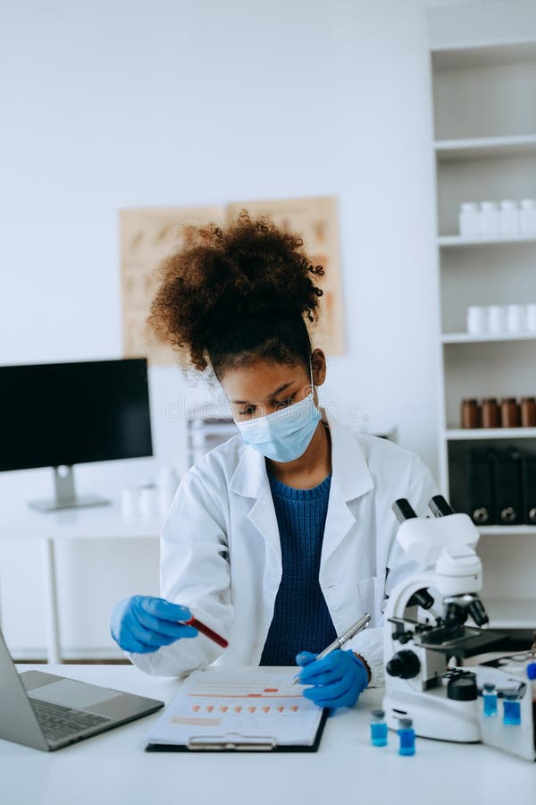 Modern Medical Research Laboratory. African Female Scientist Working ...