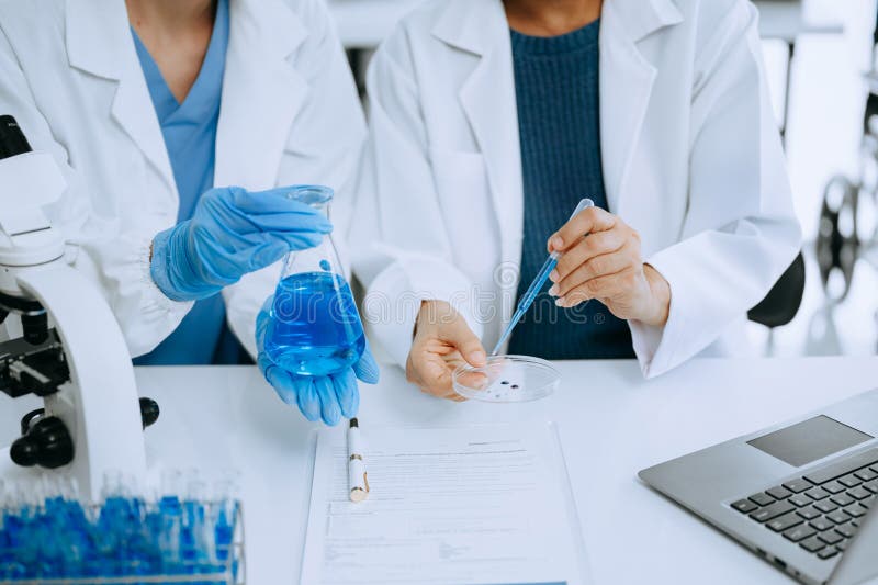 Modern Medical Research Laboratory. Female Scientist Working with Micro ...