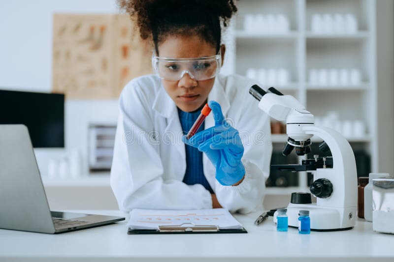 Modern Medical Research Laboratory. African Female Scientist Working ...
