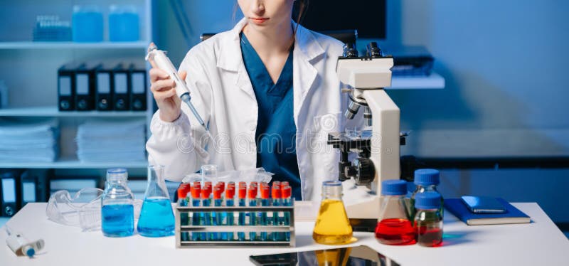 Modern Medical Research Laboratory. Female Scientist Working with Micro ...