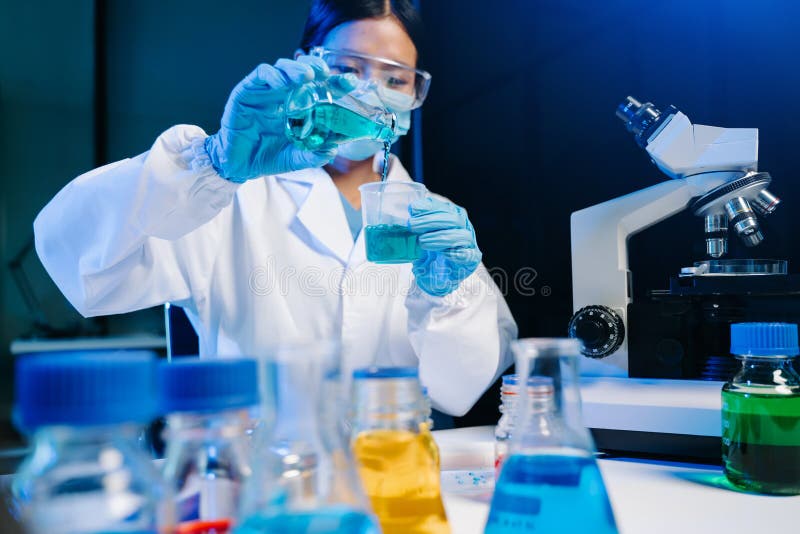 Modern Medical Research Laboratory. Female Scientist Working with Micro ...