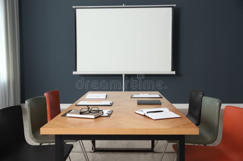 Modern Meeting Room Interior with Large Table and Projection Screen ...