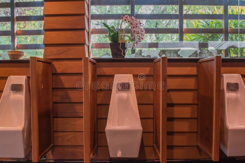 Modern Men Restroom with Urinal Row . Stock Photo - Image of clean ...