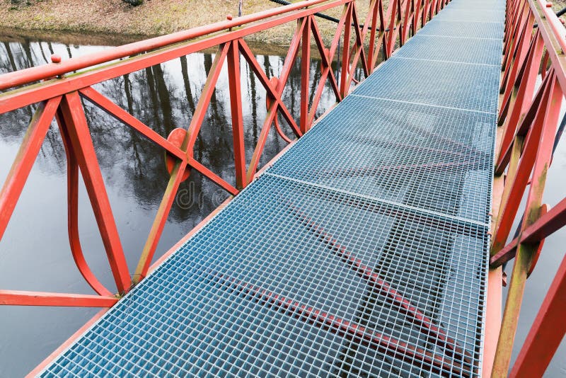 Modern Metal Bridge with Red Handrails, Perspective Stock Image - Image ...