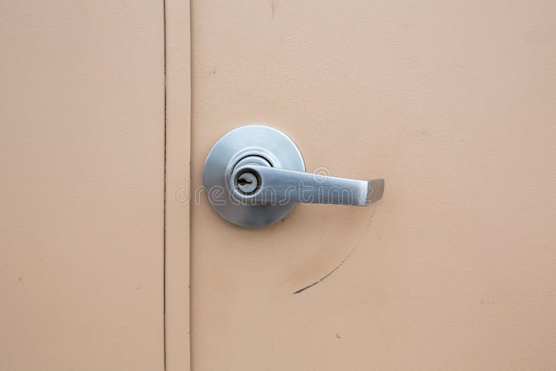 Modern metal door handle stock photo. Image of element - 125259108