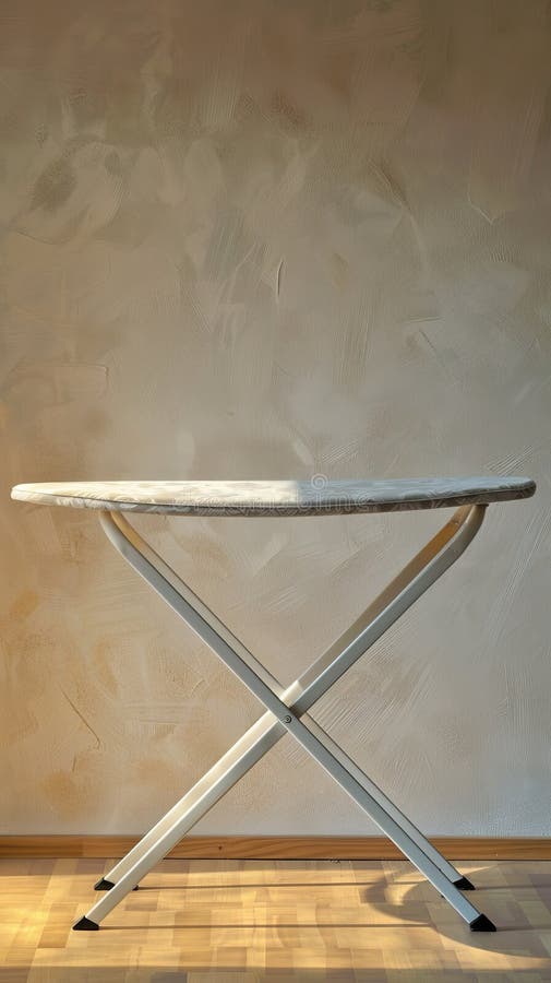 Modern Metallic Ironing Board in Front of Textured Wall, Minimalistic ...
