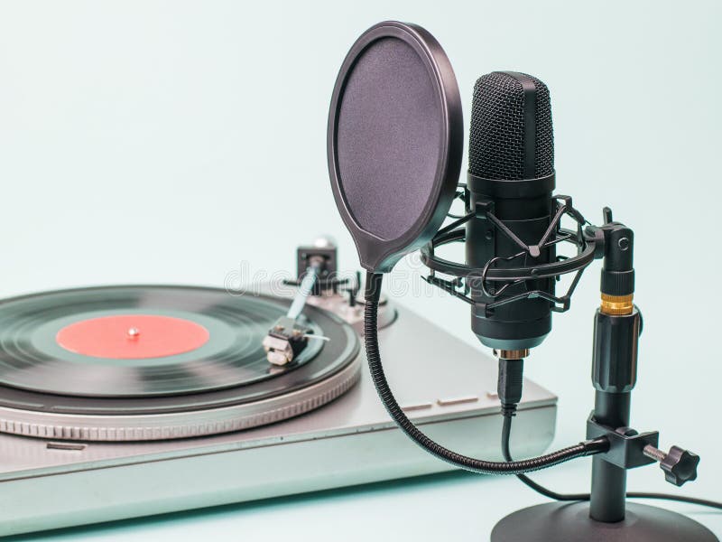 Modern Microphone on the Background of a Vinyl DISC Player Stock Image ...