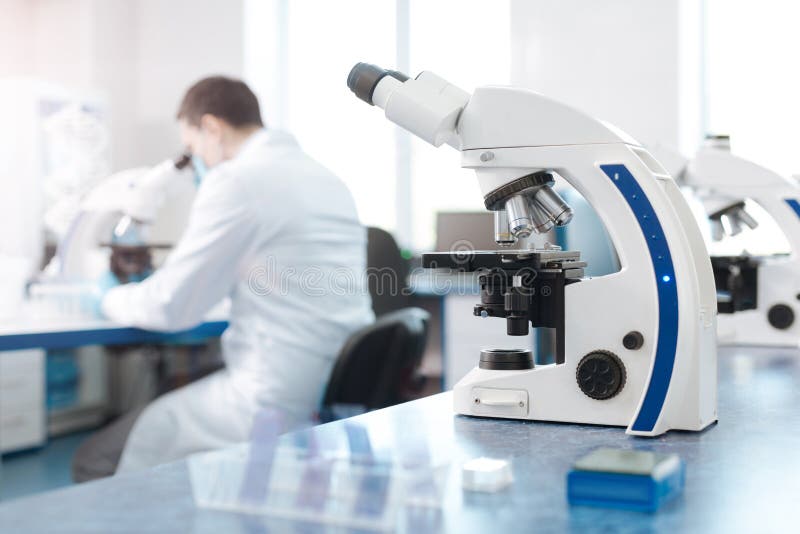 Modern Microscope Standing on the Table Stock Image - Image of lens ...