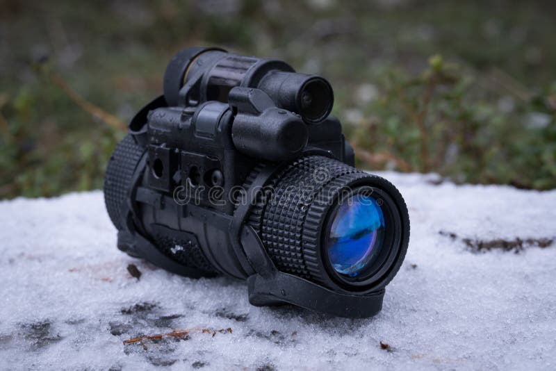 Modern Military Night Vision Monocular of the 3rd Generation on a Stump ...