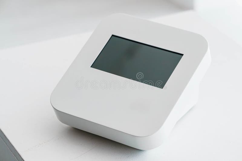 Modern Minimalistic White Digital Device with Blank Screen on Neutral ...