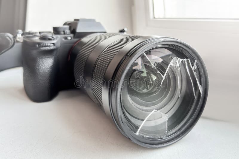 Modern Mirrorless Camera with a Broken Lens, Close-up Stock Photo ...