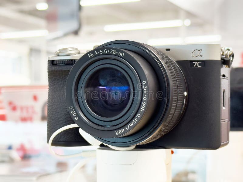 Modern Mirrorless Camera with Professional Lens Displayed in Store ...