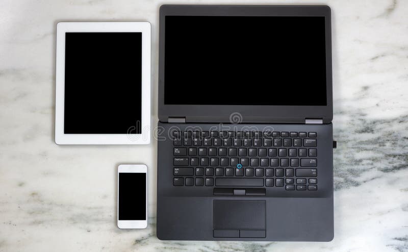 Modern Computer Electronic Devices and Baby Plant on Red Oak Desktop ...