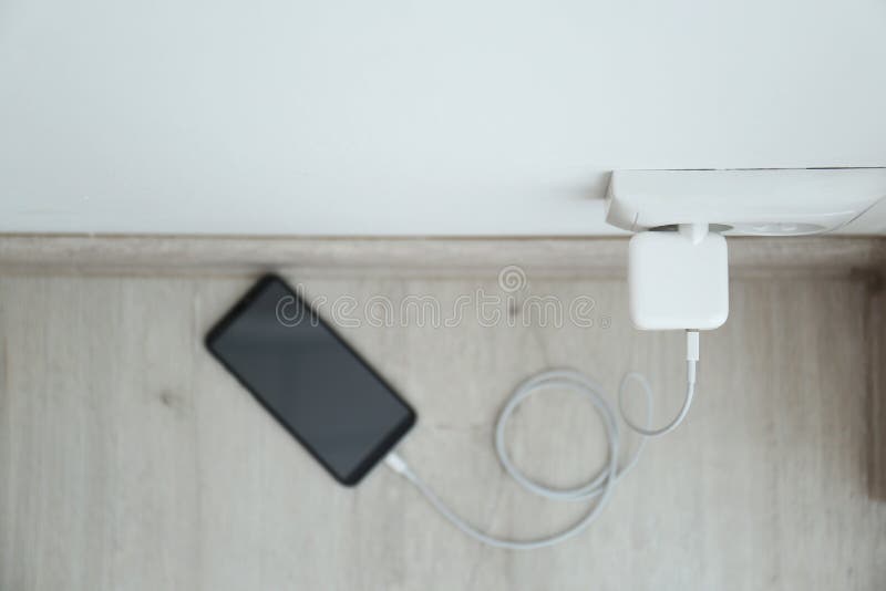 Modern Mobile Phone Charging from Electric Socket Stock Image - Image ...