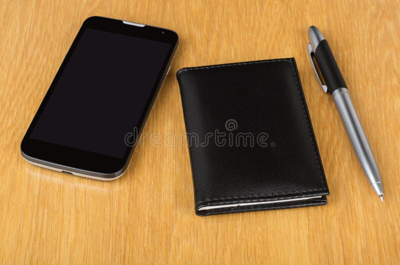 Modern Mobile Phone with Touchscreen, Notepad and Pen Stock Image ...