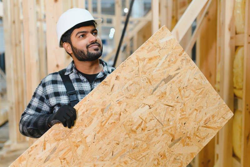Modern Modular House. Indian Worker Works on the Construction of a ...