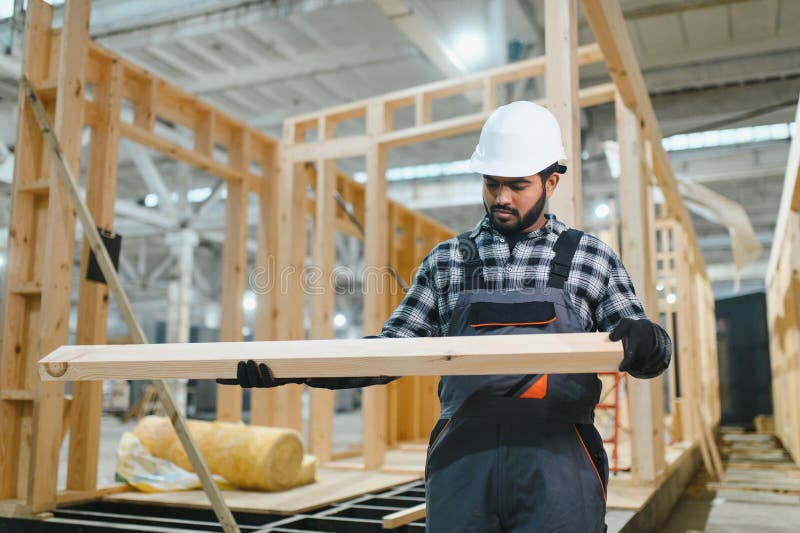 Modern Modular House. Indian Worker Works on the Construction of a ...