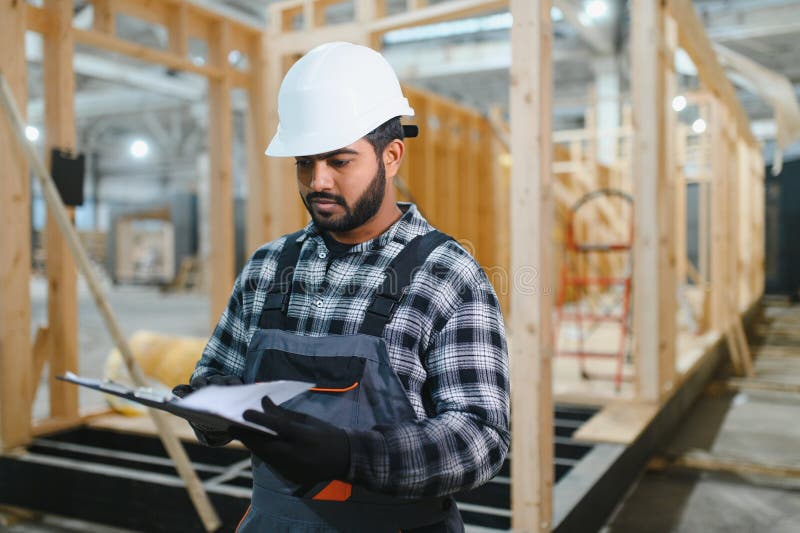 Modern Modular House. Indian Worker Works on the Construction of a ...