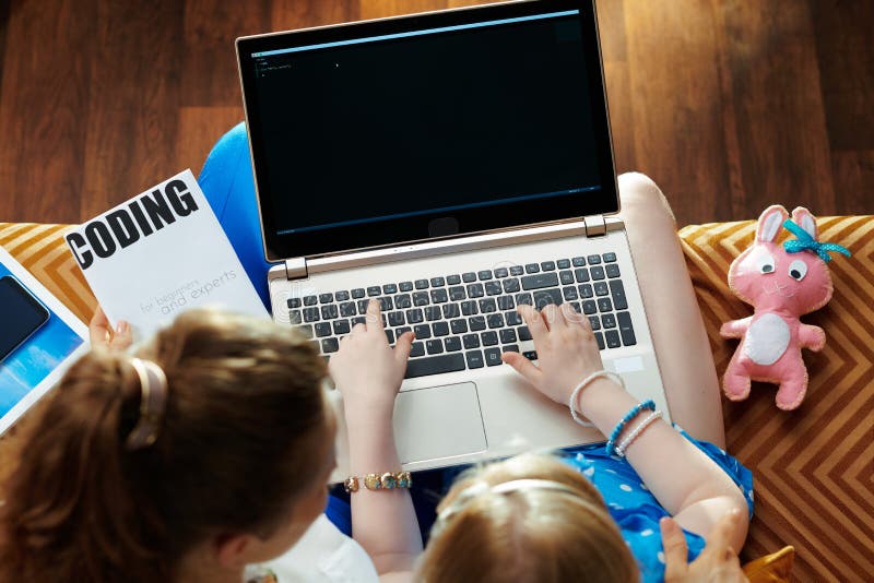 Modern Mother and Child Learn Writing Code in Editor on Laptop Stock ...