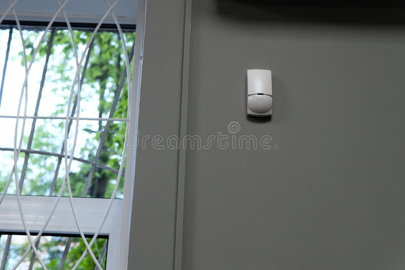 Modern Motion Sensor on Wall Indoors. Stock Photo - Image of home ...