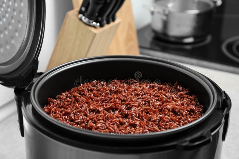 Modern Multi Cooker with Boiled Brown Rice in Kitchen Stock Photo ...