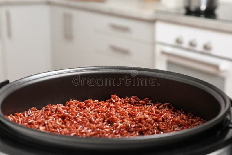 Modern Multi Cooker with Boiled Brown Rice in Kitchen, Closeup Stock ...