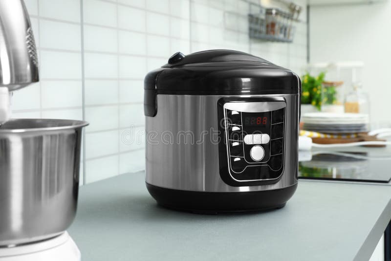 Modern Multi Cooker on Table Stock Image - Image of multicooker ...