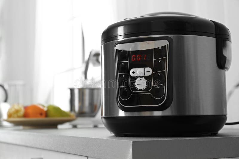 Modern Multi Cooker on Table in Kitchen Stock Photo - Image of ...