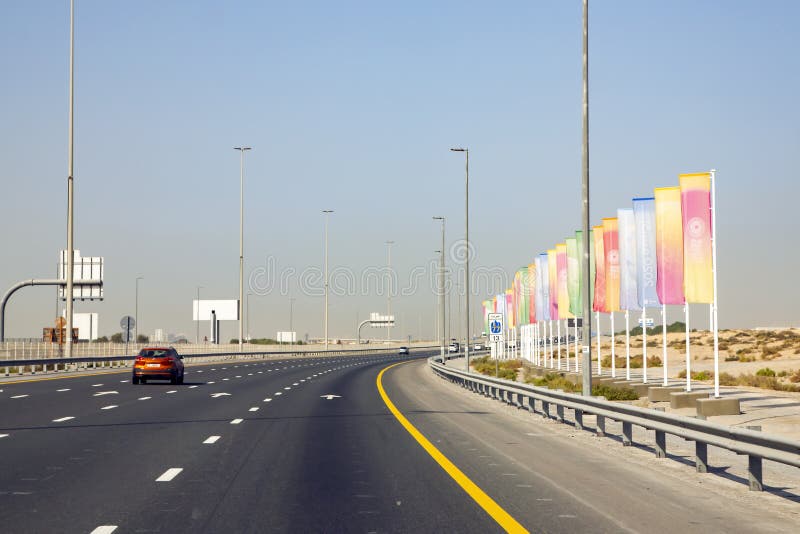 Modern Multi-lane Road with Multicolored Flags EXPO 2020 Editorial ...