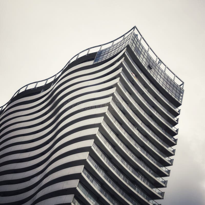 Modern Multistory Building with Wavy Exterior. Stock Image - Image of ...