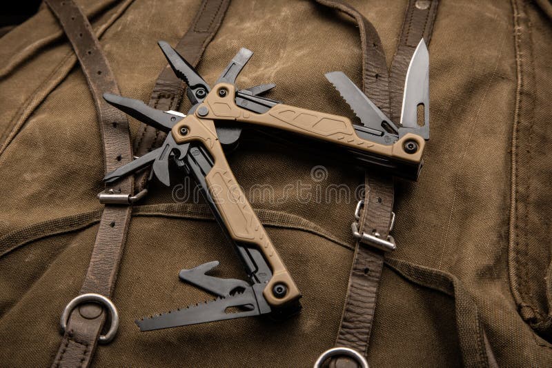 Modern Multitool with Many Tools. a Portable Multitasking Tool on a ...