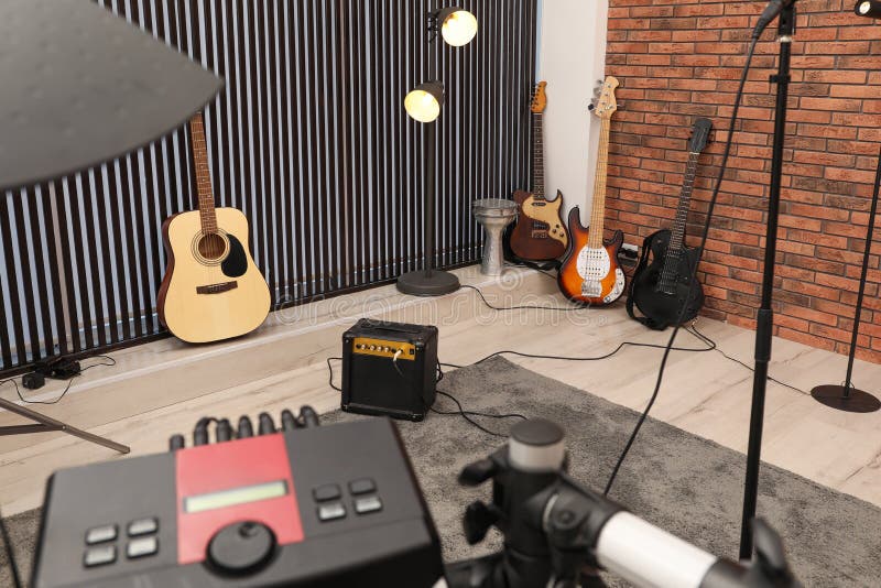 Modern Music Studio with Microphone and Different Electronic ...
