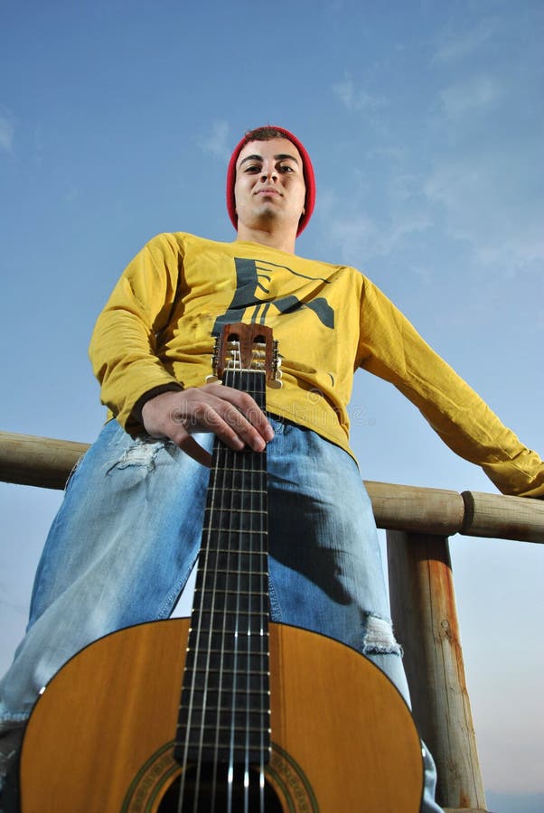 Modern Musician Posing with His Guitar Stock Photo - Image of studio ...