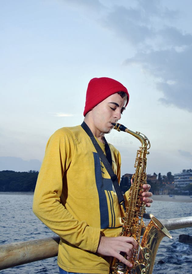 Modern Musician Posing with His Saxophone Stock Image - Image of ...