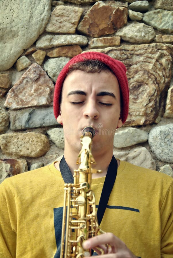 Modern Musician Posing with His Saxophone Stock Image - Image of ...