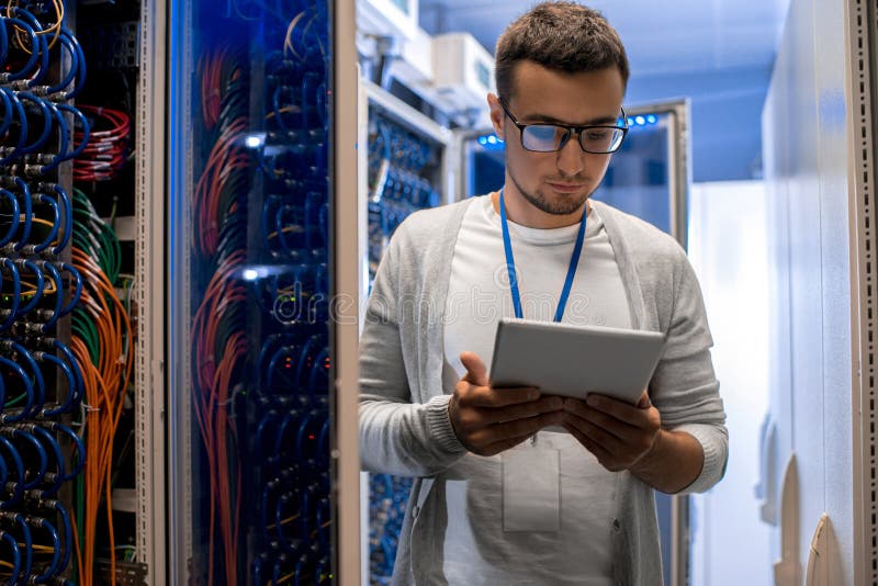 Modern Network Engineer Working with Supercomputer Stock Photo - Image ... Modern Network Engineer Working with Supercomputer Stock Photo - Image ...