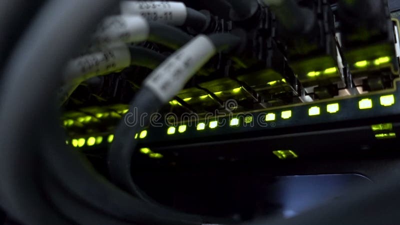 Modern Network Switch with Cables. Server Room. Flashing LED Lights ...