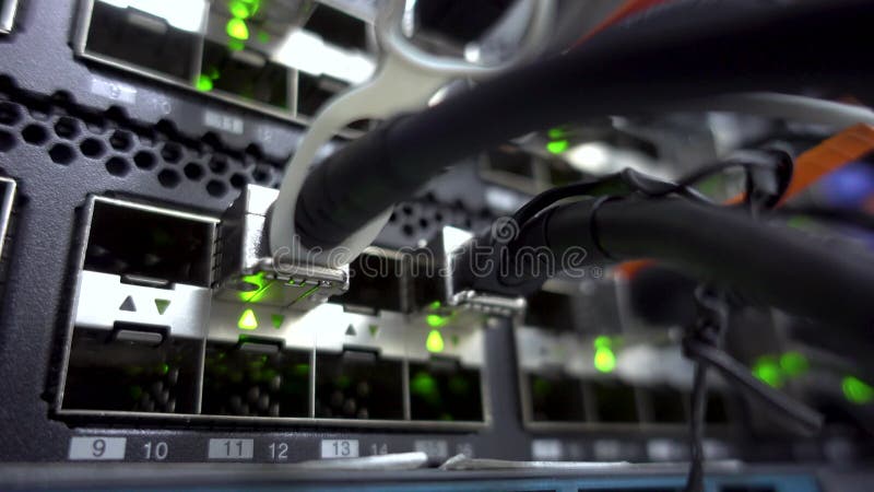 Modern Network Switch with Cables. Server Room. Flashing LED Lights ...