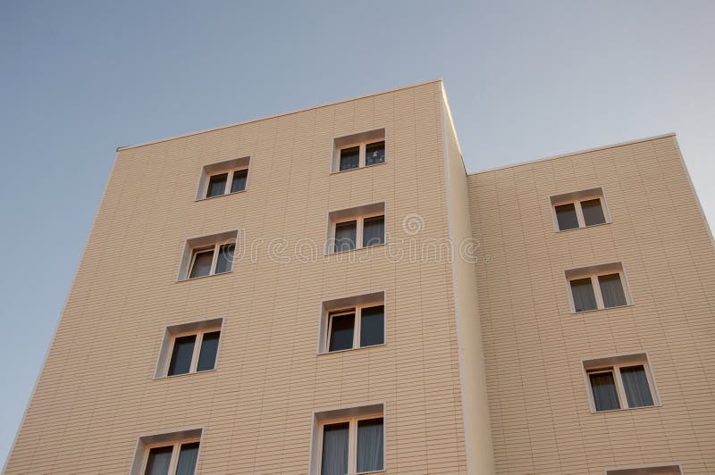 Modern New Building with a Lot of Flats. There are Windows and ...