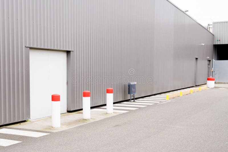 Modern New Grey Warehouse Hangar Exterior with Emergency Exit Door Gate ...