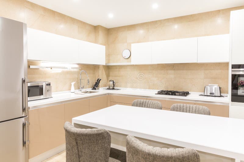 Modern New Kitchen in a Luxurious Apartment Stock Photo - Image of lamp ...