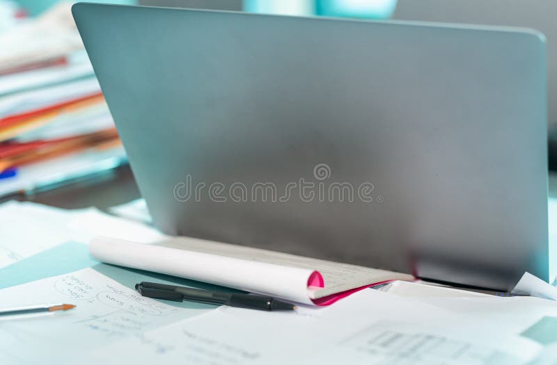 Modern Notebook on a Cluttered Desktop Stock Image - Image of design ...