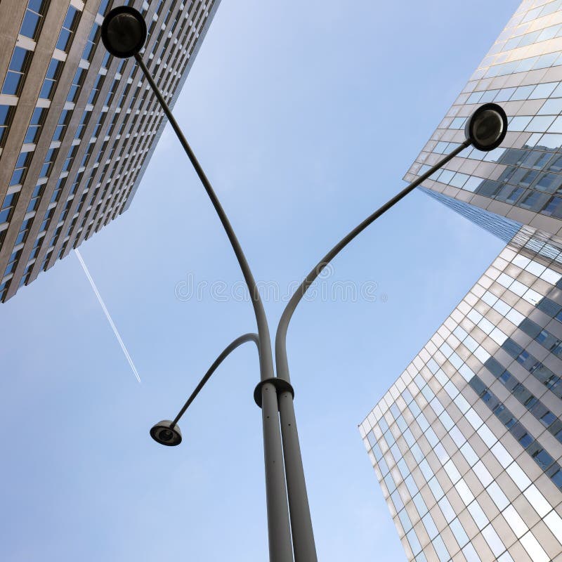 Modern Office Architecture and Lamp Post Under Blue Sky and Clouds ...