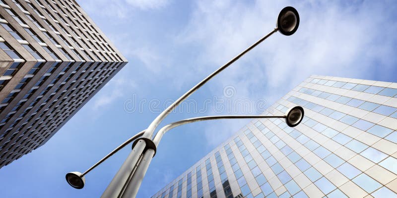 Modern Office Architecture and Lamp Post Under Blue Sky and Clouds ...