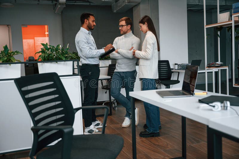 In the Modern Office. Couple are Getting Consulted by a Manager Stock ...