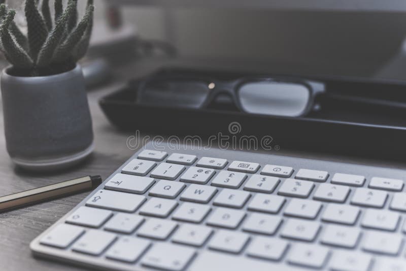 Modern Office Desk with Computer Keyboard and Office Objects on Wooden ...