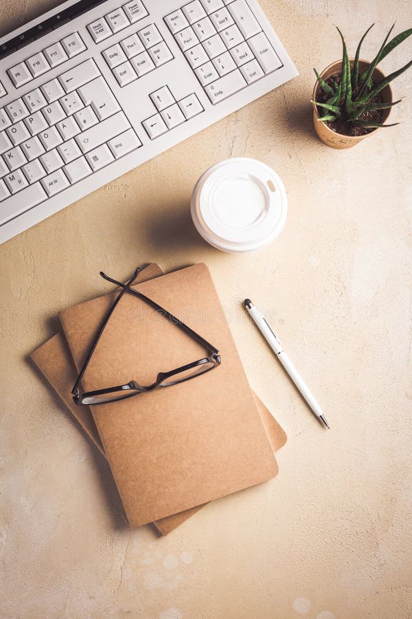 Modern Office Desk Table with Laptop Computer, Notepad, Tablet, Plant ...