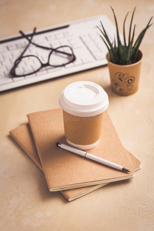 Modern Office Desk Table with Laptop Computer, Notepad, Tablet, Plant ...
