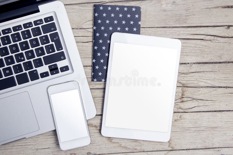 Modern Office Desk with Tablet, Handy and Notepad Stock Photo - Image ...