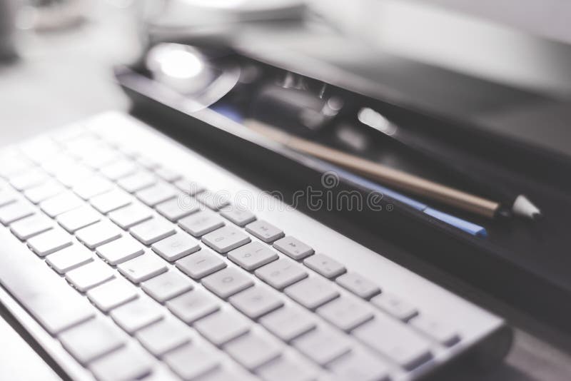 Modern Office Desk Workspace with Close Up on Computer Keyboard Stock ...